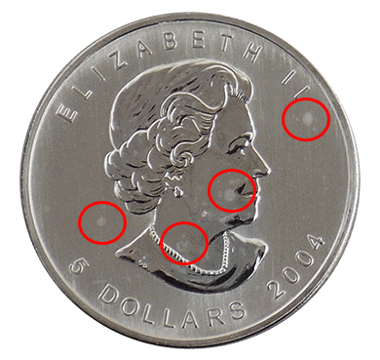 What Are Milk Spots & How Do They Affect The Value Of Silver Coins?